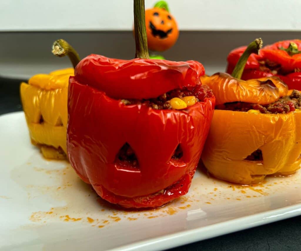 Halloween Jack O'Lantern Stuffed Peppers - The Scatty Mum